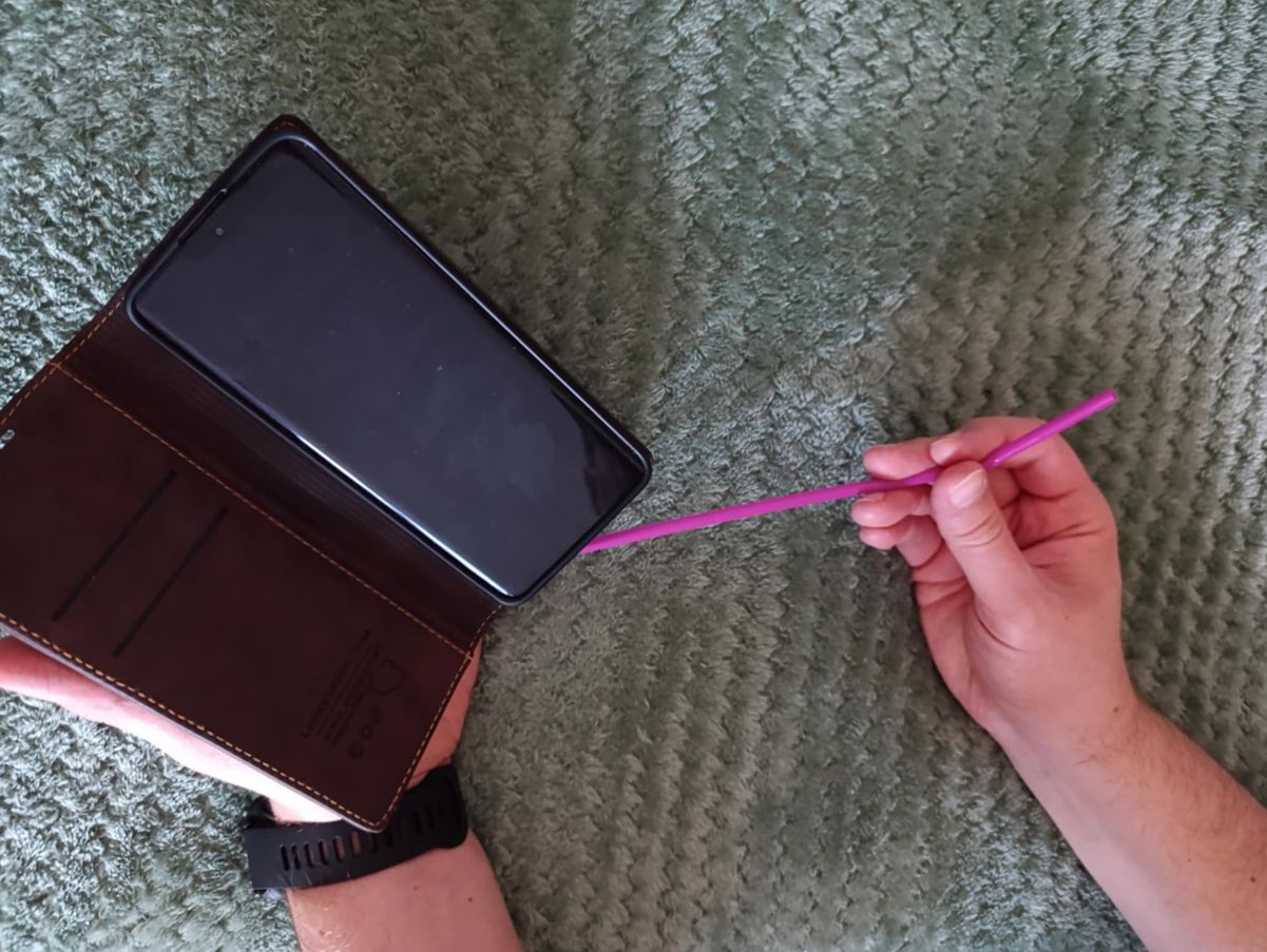 Revolutionary straw hack keeps your phone dust-free and safe