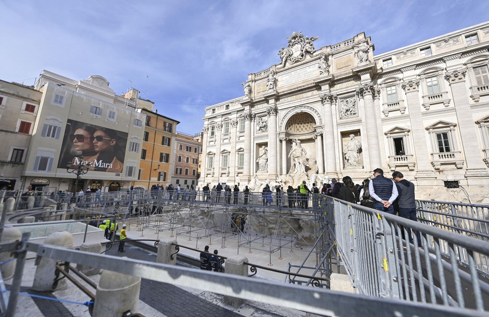 Rome's iconic sites cloaked in scaffolding for Holy Year prep