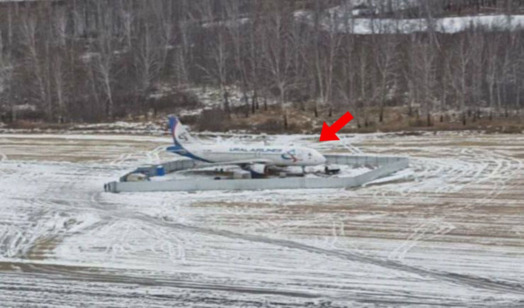 Emergency landing in a field leaves Russian plane stranded
