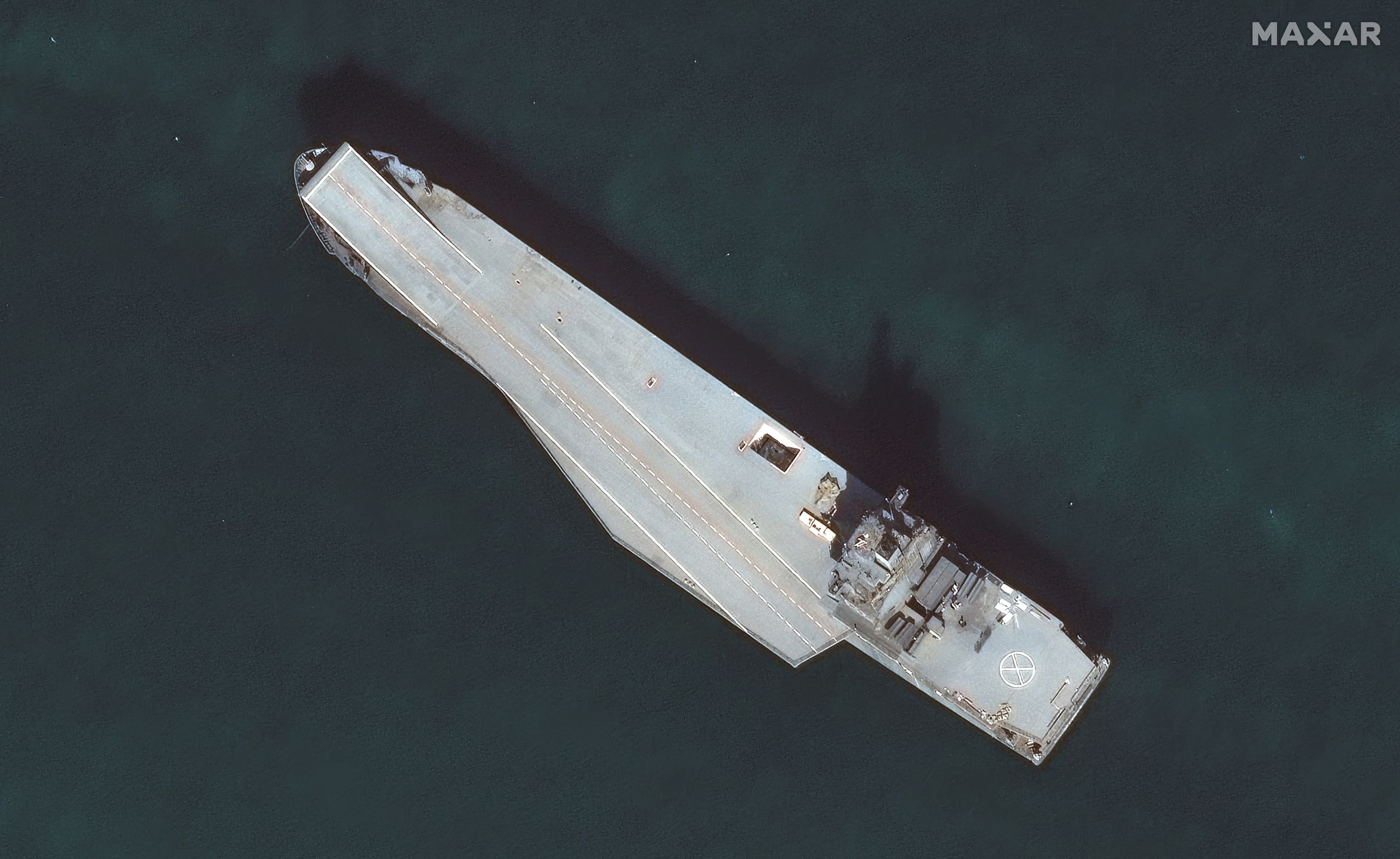 Iran unveils converted cargo ship as first aircraft carrier