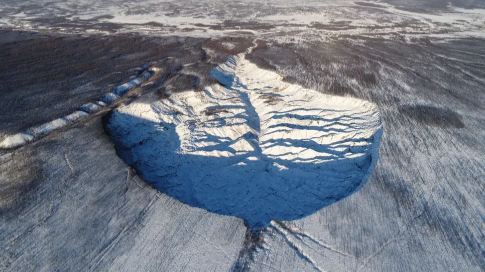 Siberia's growing gateway to hell crater sparks climate fears Siberia's growing gateway to hell crater sparks climate fears